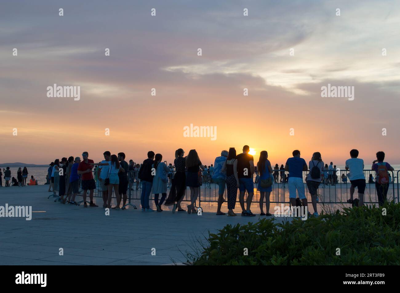Zadar, Croatia - 15 June 2019: Tourists enyoing amazing sunset on the ...