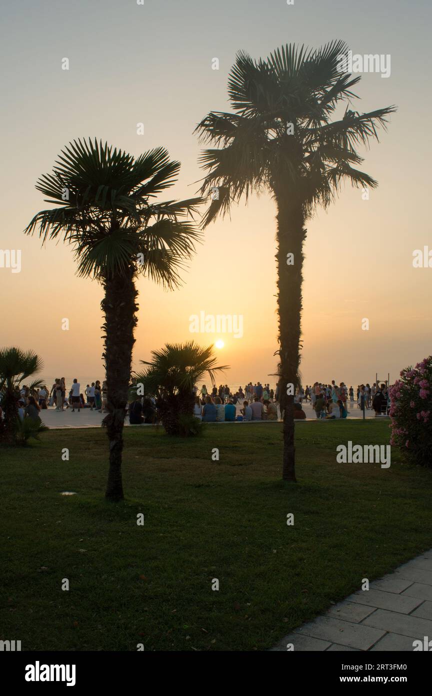 Zadar, Croatia - 21 July 2023: Tourists enyoing amazing sunset on the ...
