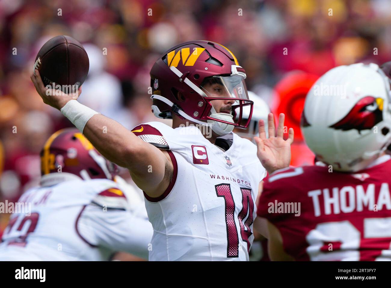 Washington Commanders quarterback Sam Howell (14) throwing the ball ...