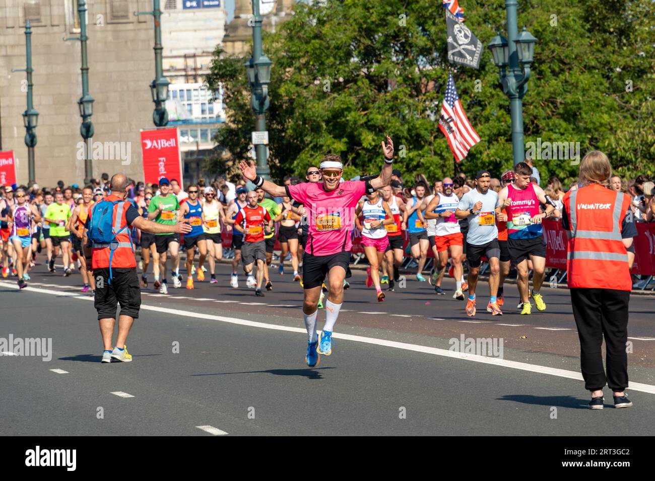 Great North Run 2023. A runner celebrates crossing the Tyne Bridge in ...