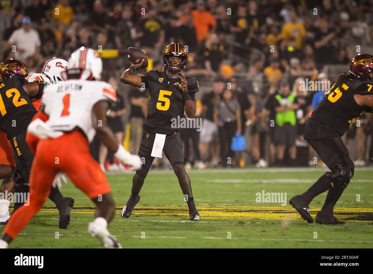 Arizona State quarterback Jaden Rashada (5) throws the ball down field ...
