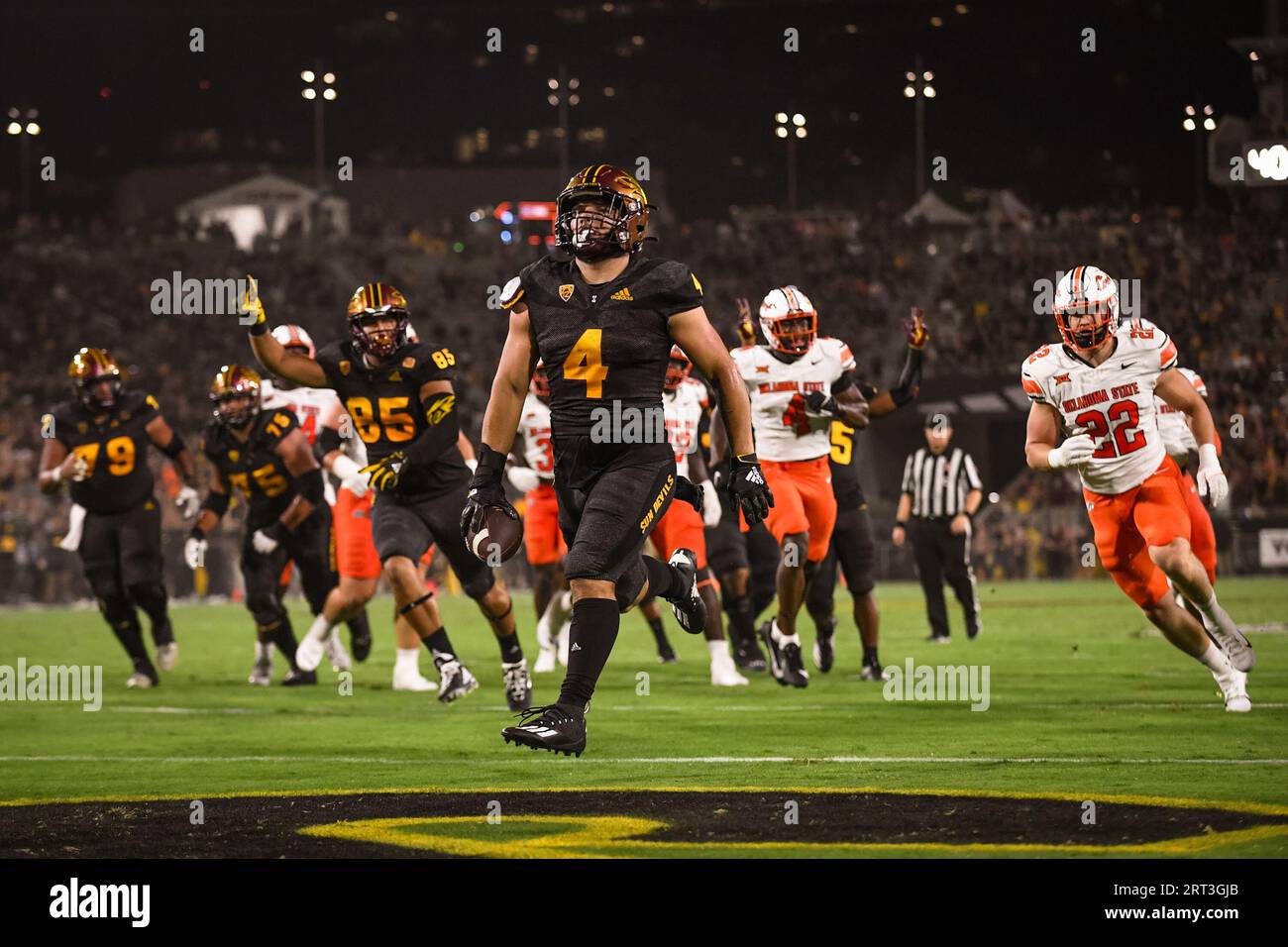 Arizona State running back Cam Skattebo (4) runs for a touchdown in the ...