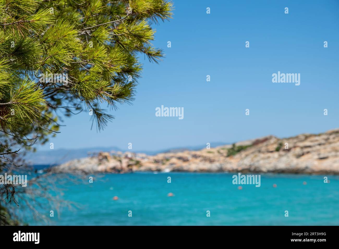 Agistri island Aponisos beach destination Greece. Blur rocky beach sea ...