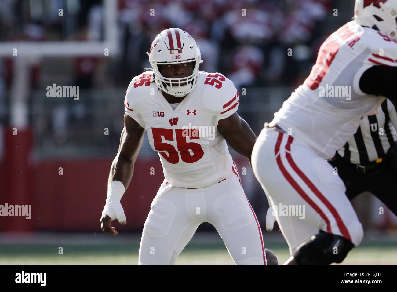 Wisconsin linebacker Maema Njongmeta (55) follows a play during the ...