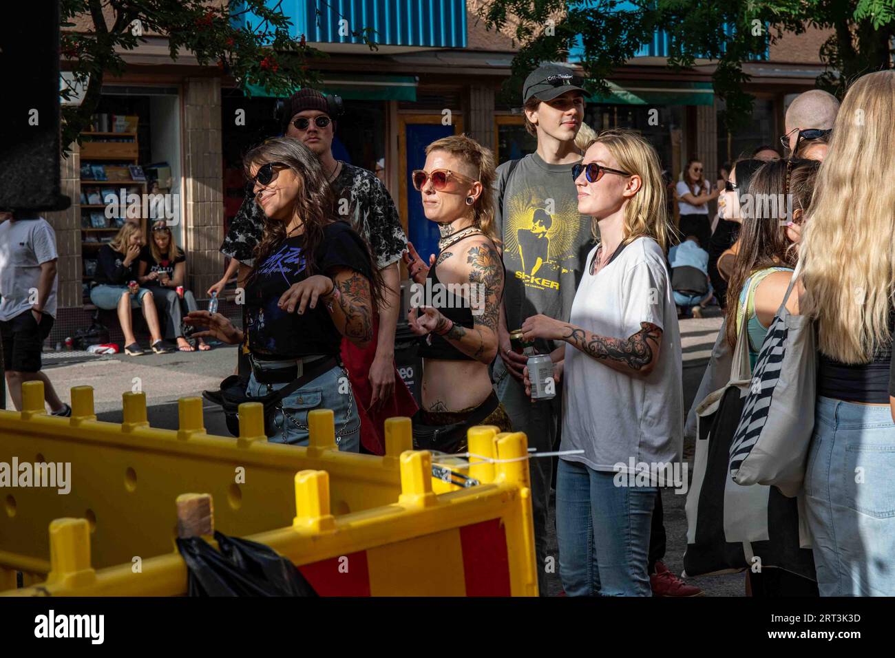 Young people listening and dancing to DJ music in Vaasankatu at Kallio ...
