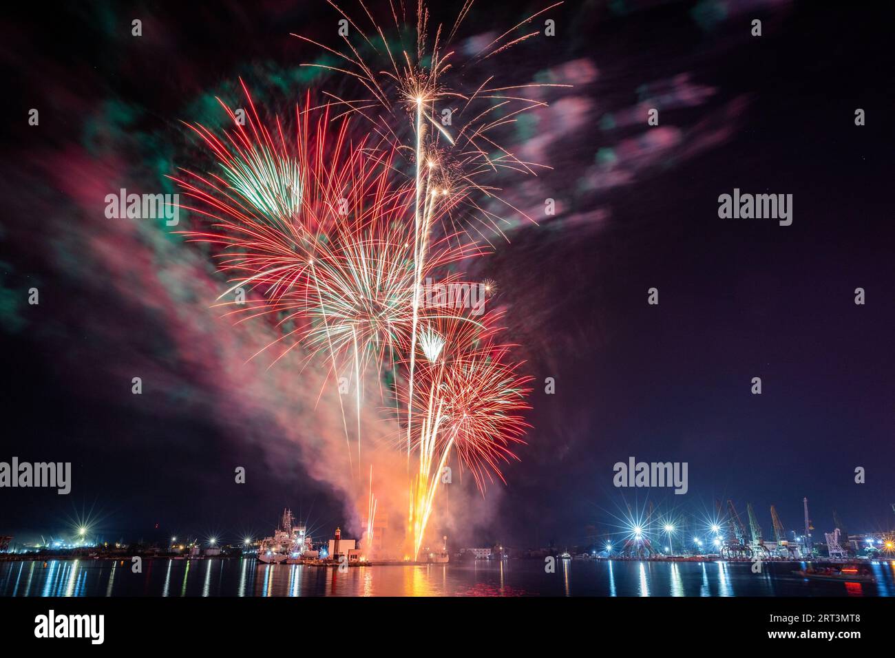 A vertical shot of a Spectacular night sky with an array of fireworks ...