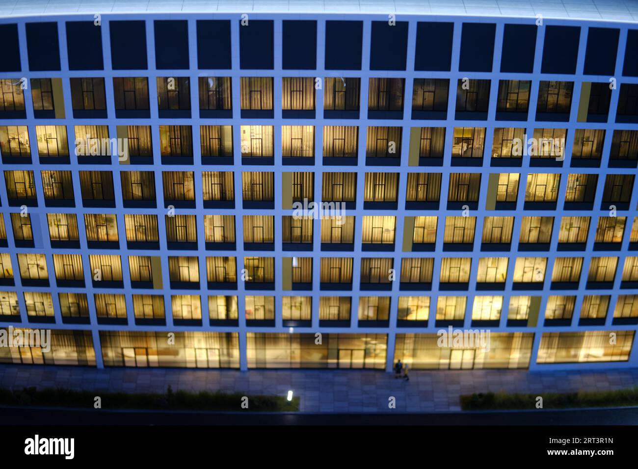 Night view of modern miniature office building. Architectural detail of ...