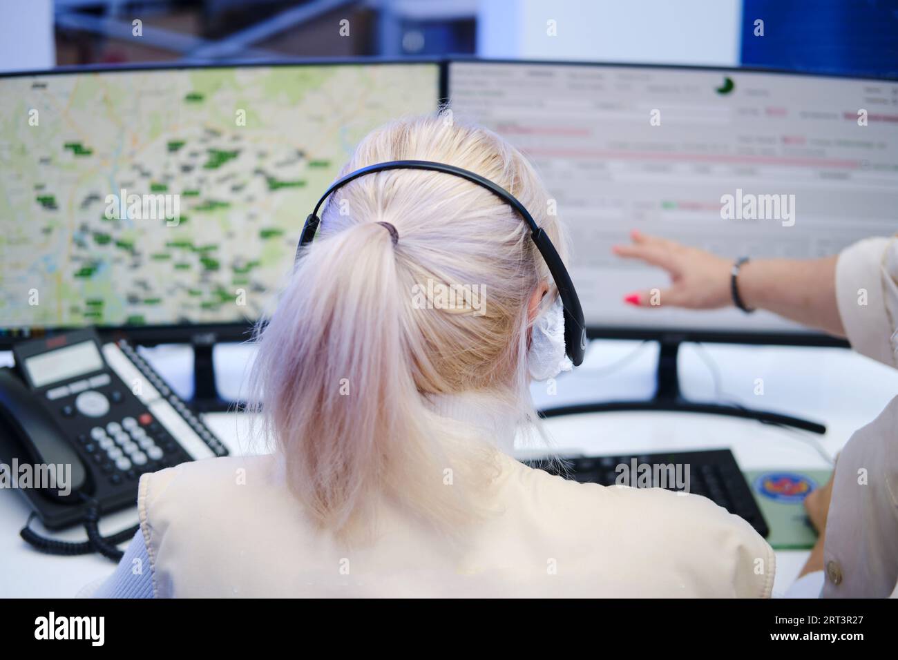 Operator with headset on monitor screen hi-res stock photography and ...