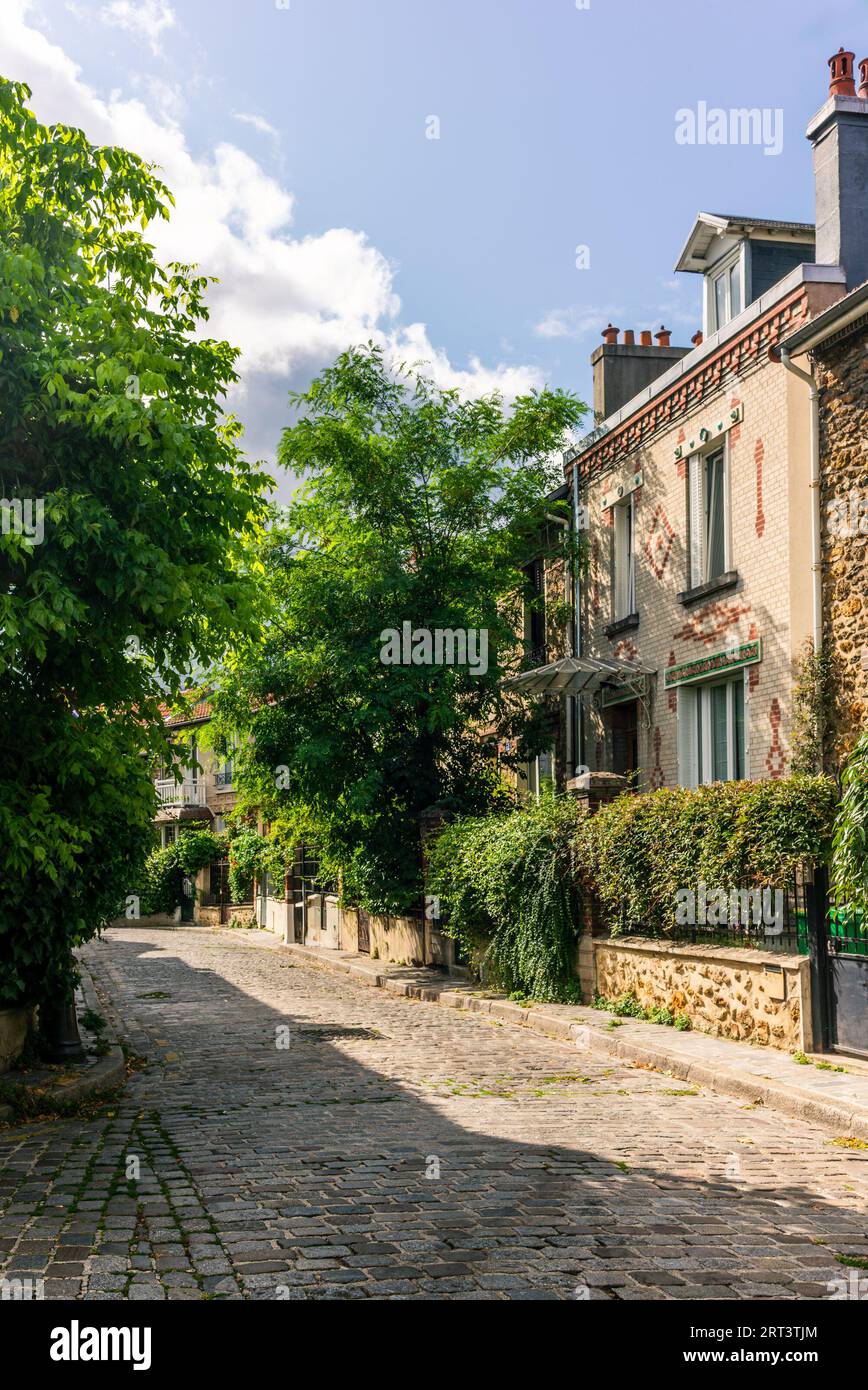 The paved streets and pretty low houses of "La Campagne ä Paris" ("the ...