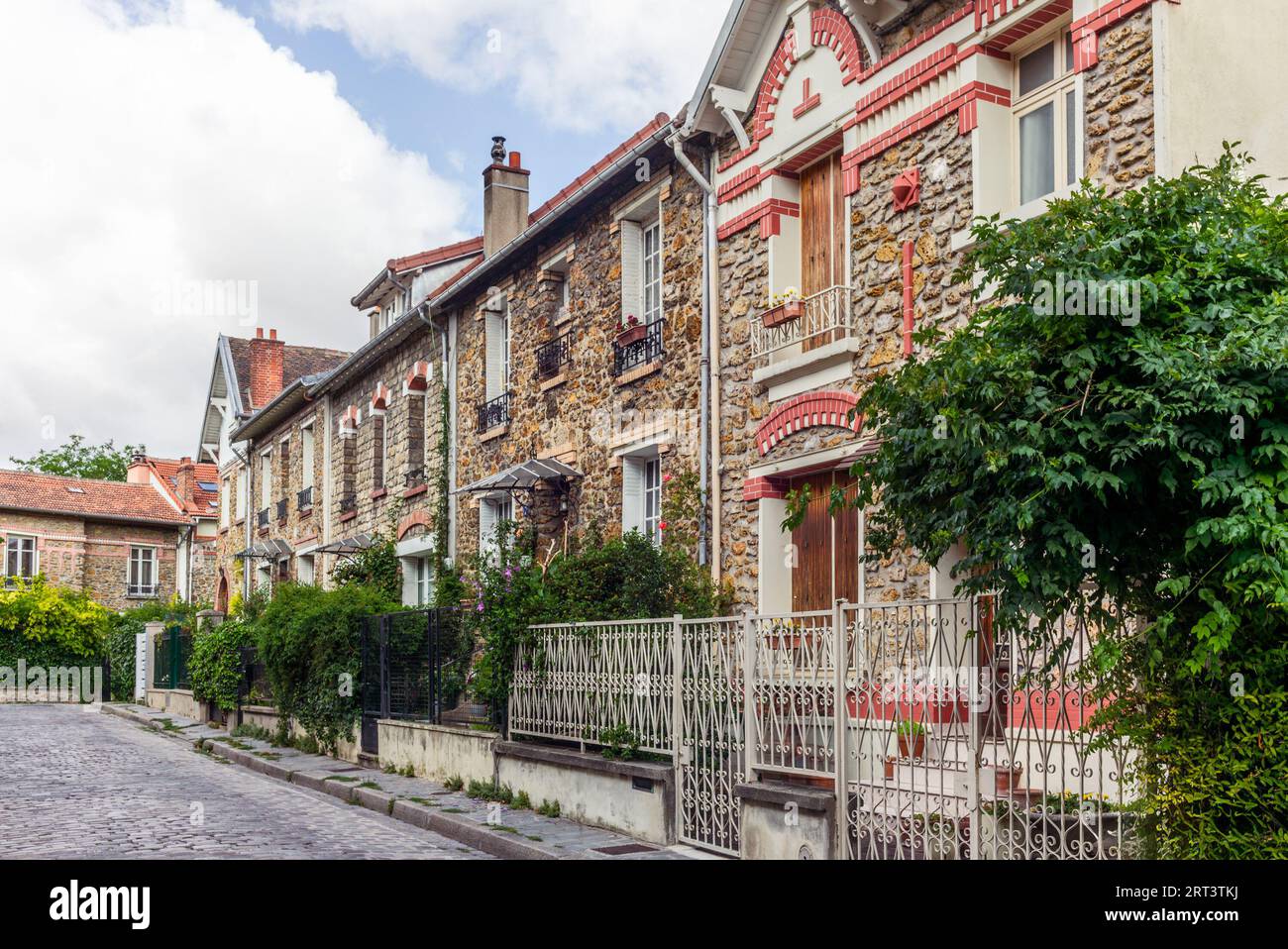 The paved streets and pretty low houses of "La Campagne ä Paris" ("the ...