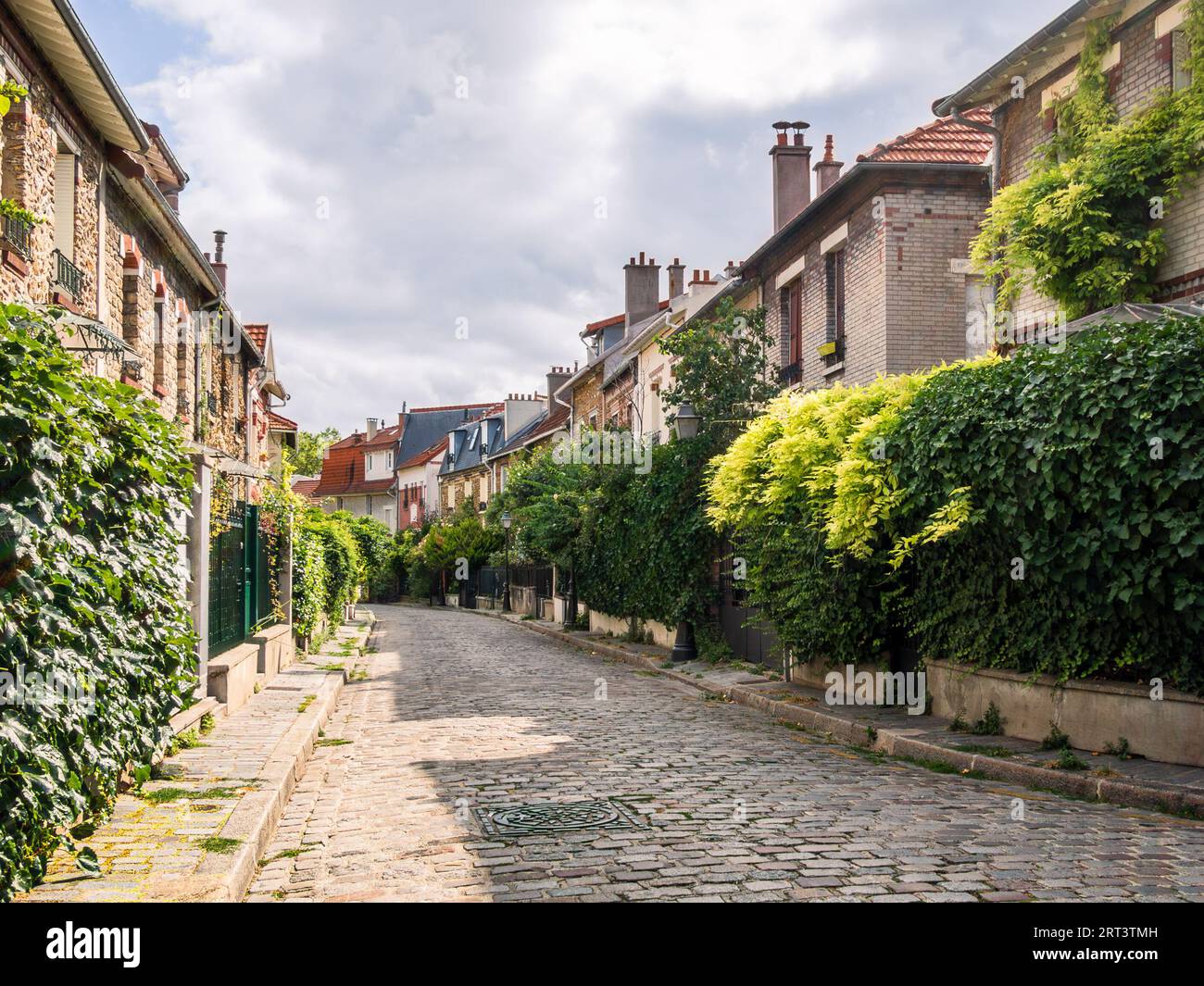 The paved streets and pretty low houses of "La Campagne ä Paris" ("the ...