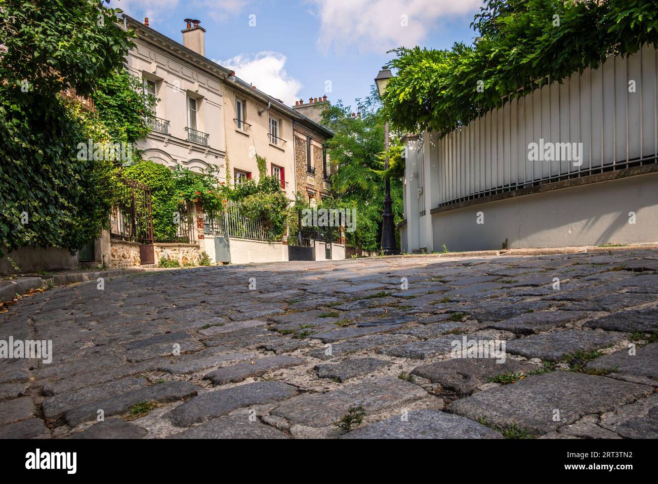 The paved streets and pretty low houses of "La Campagne ä Paris" ("the ...