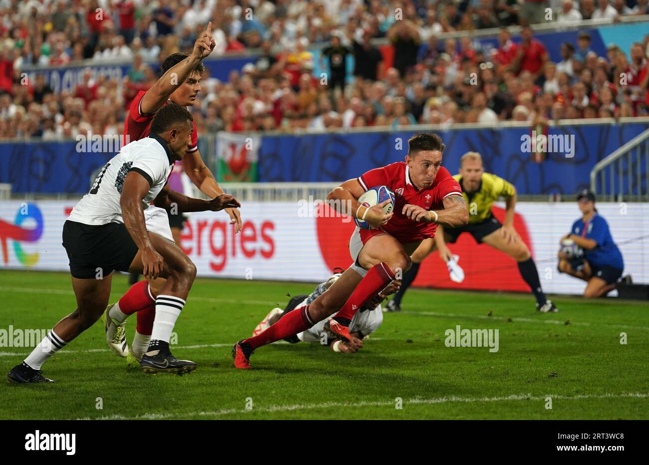 Wales' Josh Adams scores their side's first try during the 2023 Rugby ...