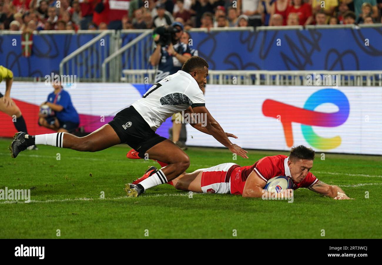 Wales' Josh Adams scores their side's first try during the 2023 Rugby ...