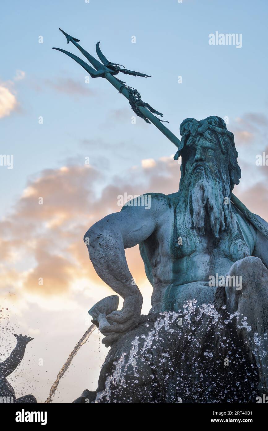 Copper fountain of Neptune with a trident (Neptunbrunnen) in Berlin at ...