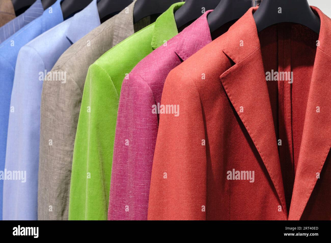 Racks with different men's suits in a men's clothing boutique Stock ...