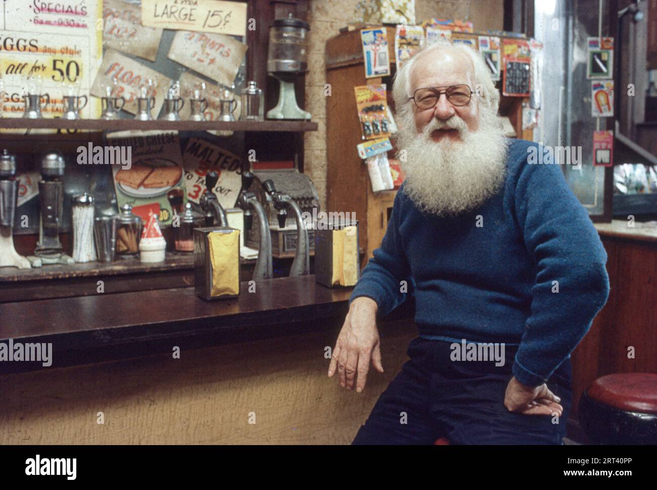 Legendary puppet builder Kermit Love on the set of Sesame Street seated ...