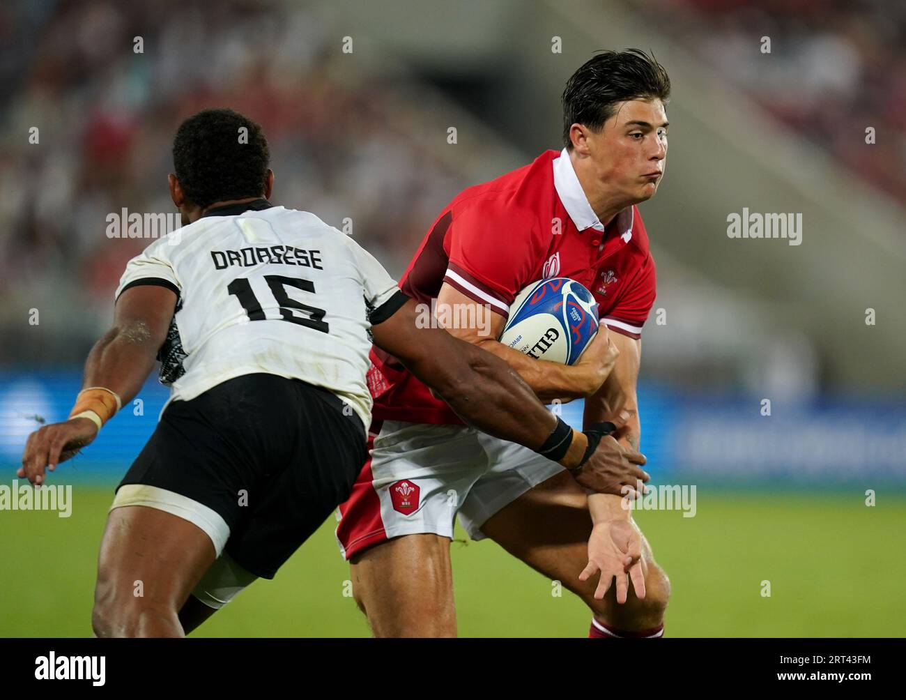 Wales' Louis Rees-Zammit and Fiji's Ilaisa Droasese during the 2023 ...