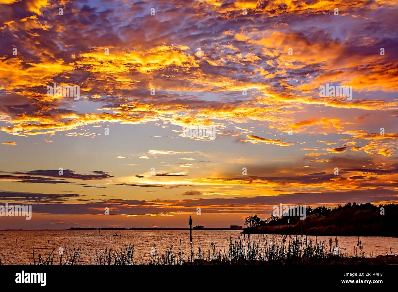 A stormy afternoon gives way to a dramatic sunset over Coden Beach ...