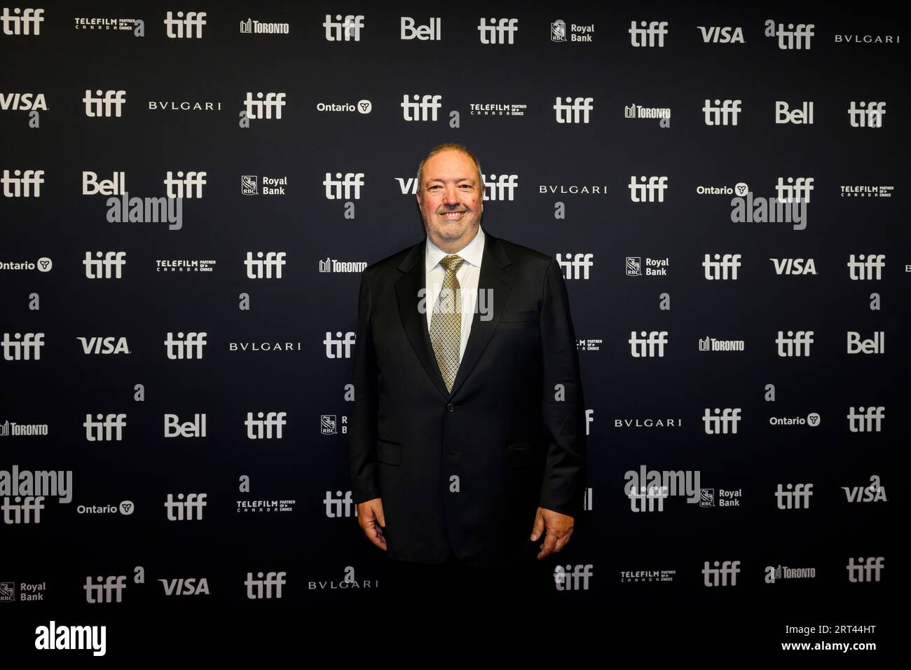Executive producer Jean-Luc De Fanti is photographed on the red carpet ...