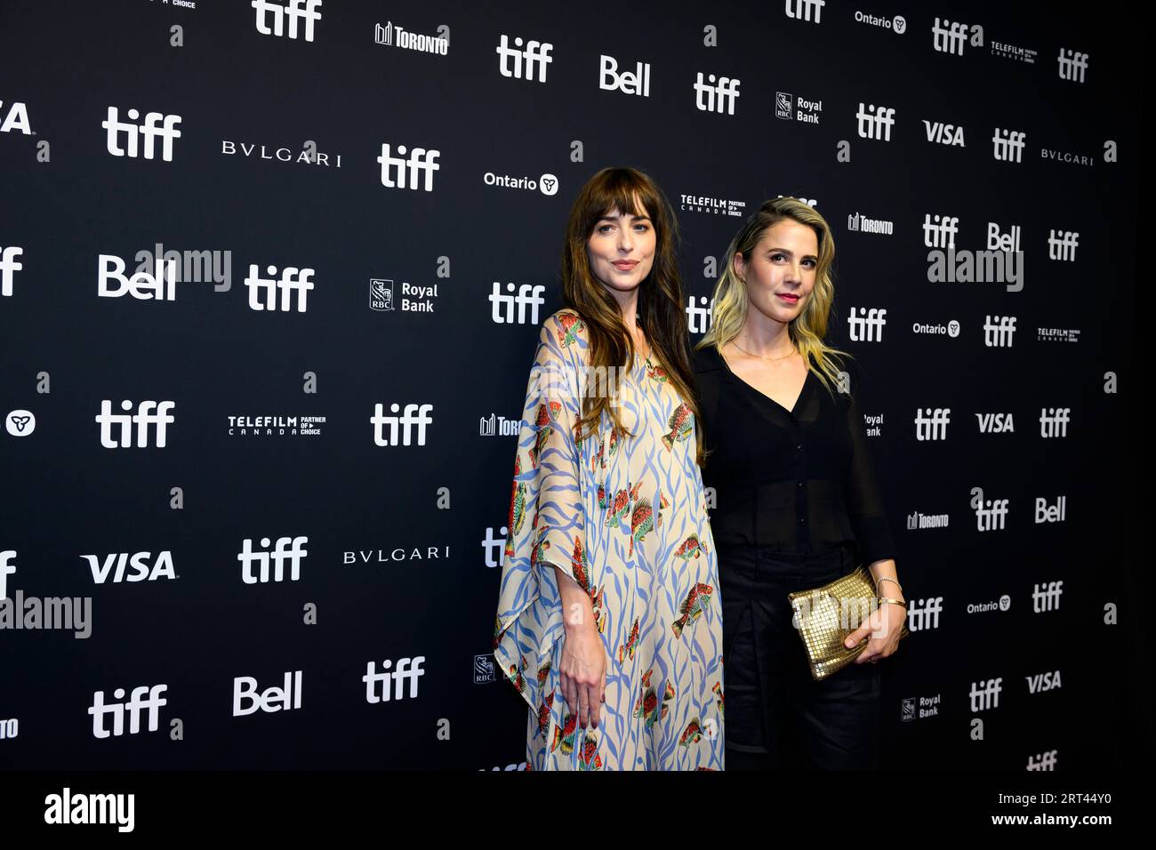 Dakota Johnson and director Christy Hall are photographed on the red ...