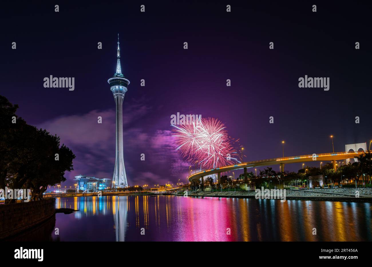 Night view of the Macau Tower with New Year fireworks at Macao Stock ...