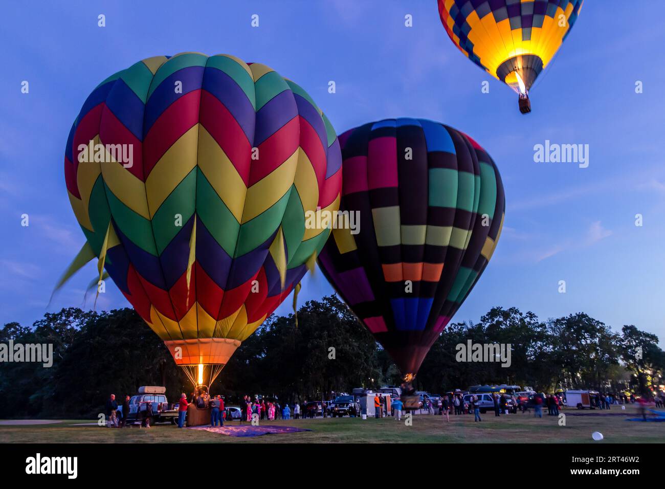 3 balloons ready to launch a daylight patrol. One is already in the air ...