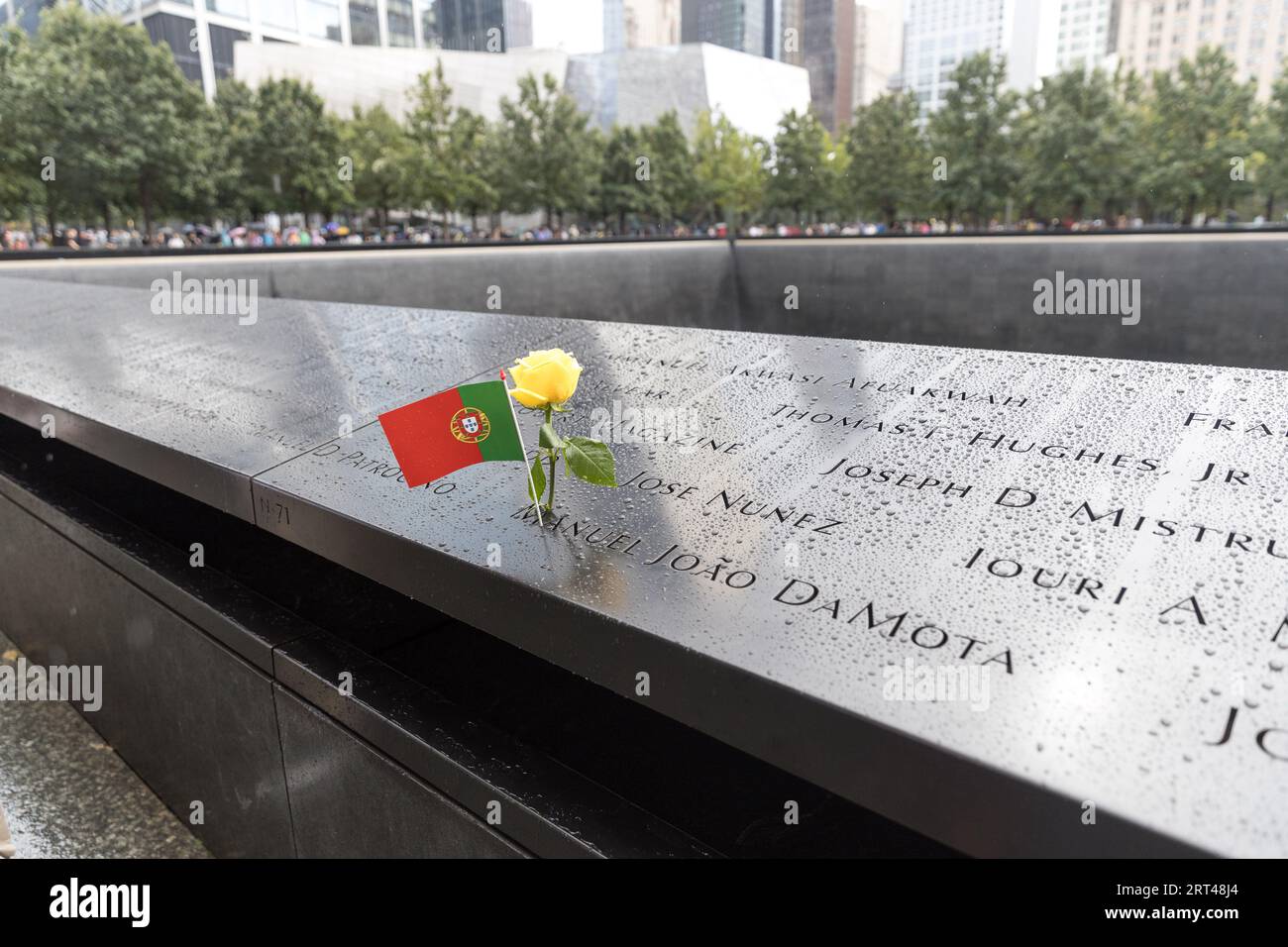 Public, Flags and flowers are seen at the Pool site where the WTC ...