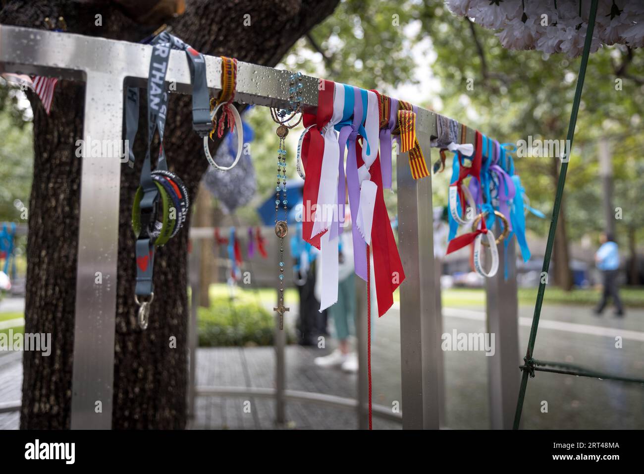 Public, Flags and flowers are seen at the Pool site where the WTC ...