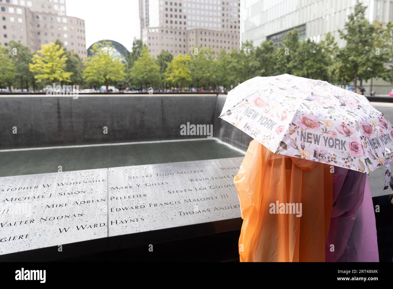 Public, Flags and flowers are seen at the Pool site where the WTC ...