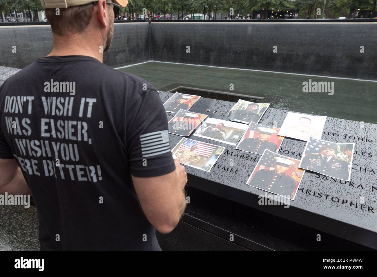 Public, Flags and flowers are seen at the Pool site where the WTC ...