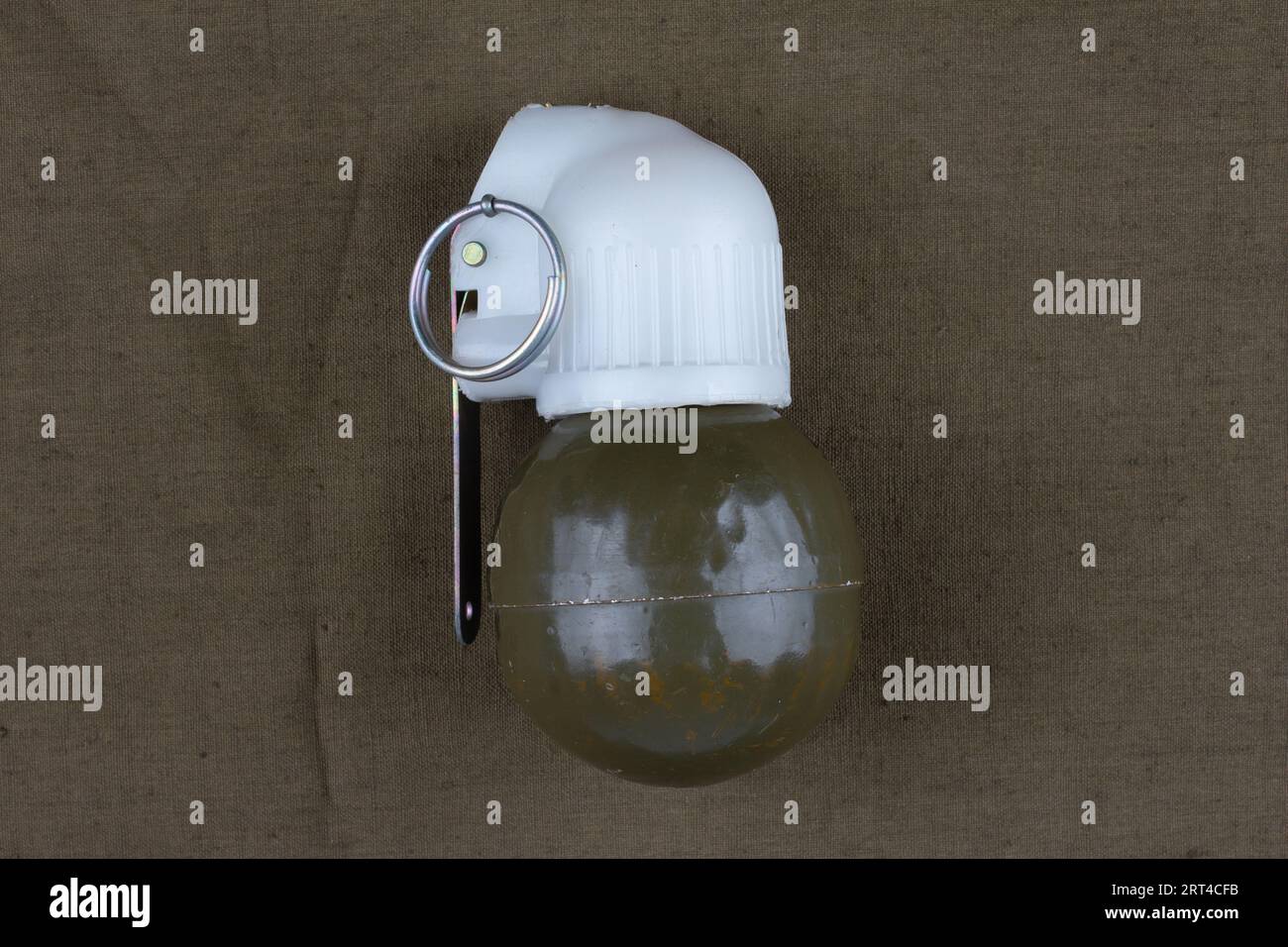Soviet hand grenade RGN on khaki canvas background Stock Photo - Alamy