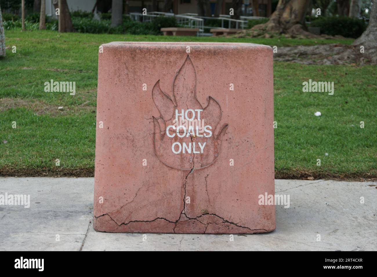 A fire proof container for hot coals at the park Stock Photo - Alamy