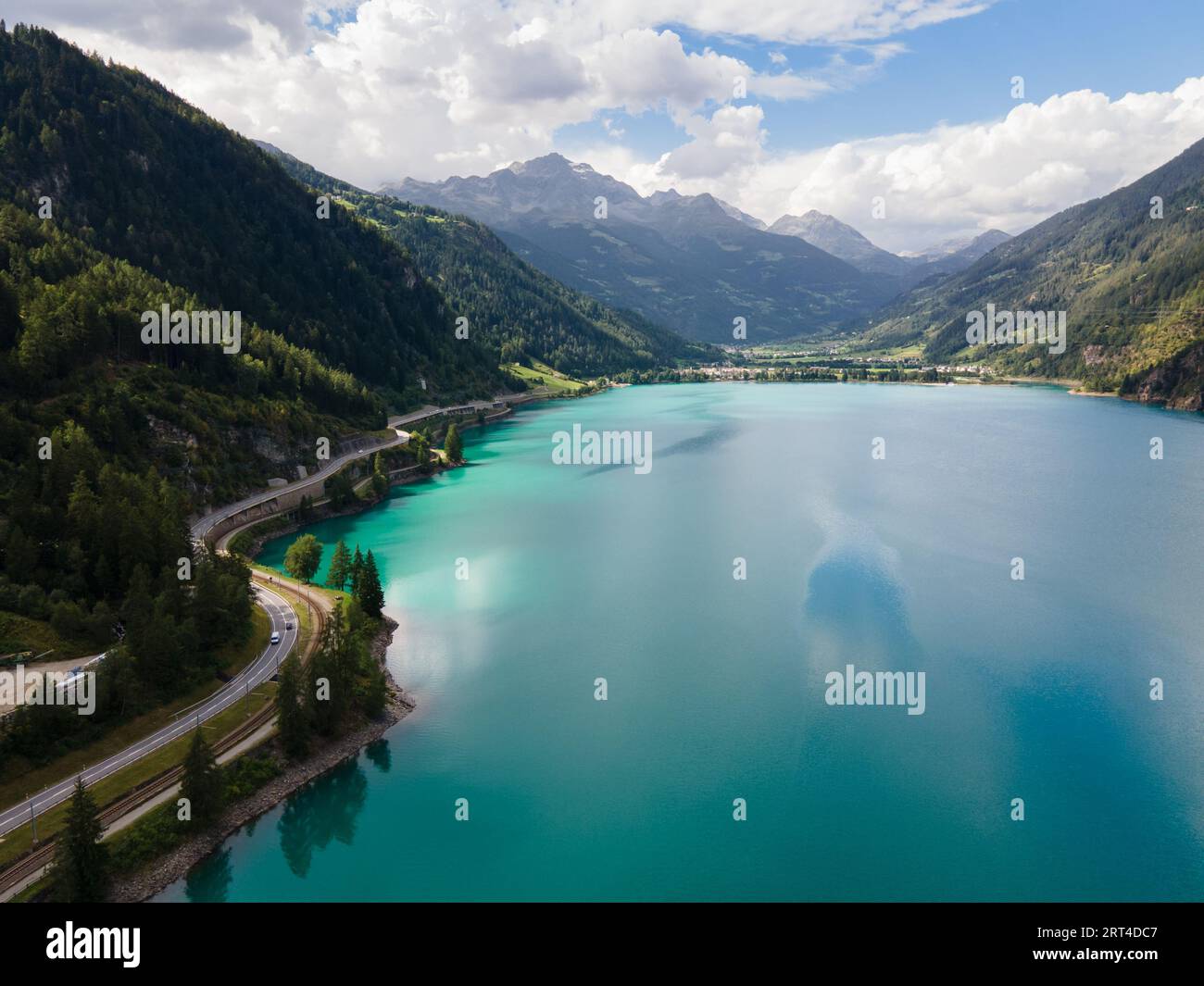 Aerial drone view of Poschiavo alpine lake and road in the Switzerland ...