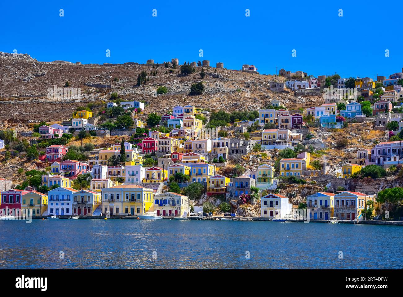 Colorful houses village in Symi island, Dodecanese islands, Greece ...