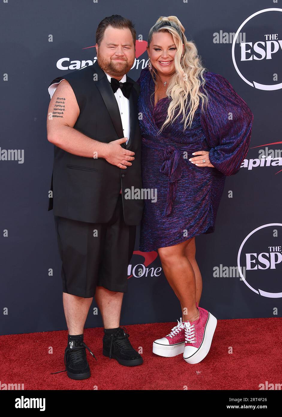 July 12, 2023, Hollywood, California, USA: Paul Walter Hauser and Amy Hauser arrives for the ...