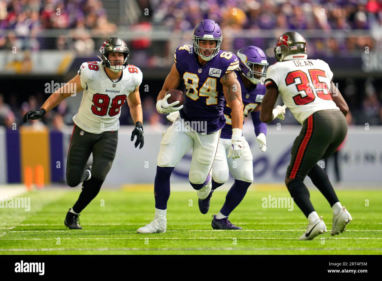 Minnesota Vikings tight end Josh Oliver (84) carries the football down ...