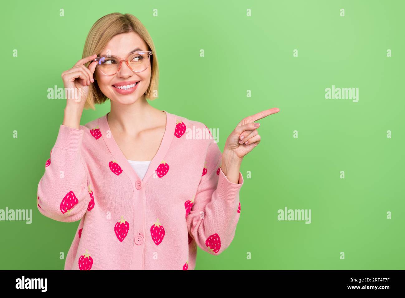 Photo of pretty young girl point look empty space specs dressed stylish ...