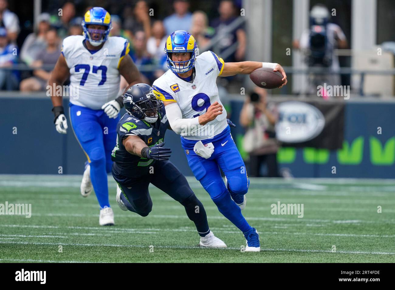 Los Angeles Rams quarterback Matthew Stafford is tackled by Seattle ...