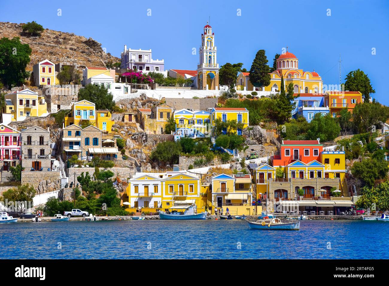 Colorful houses village in Symi island, Dodecanese islands, Greece ...