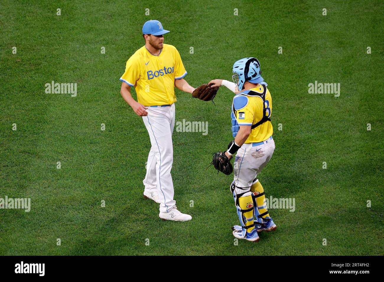 Boston Red Sox catcher Reese McGuire (3) gives the ball to relief ...