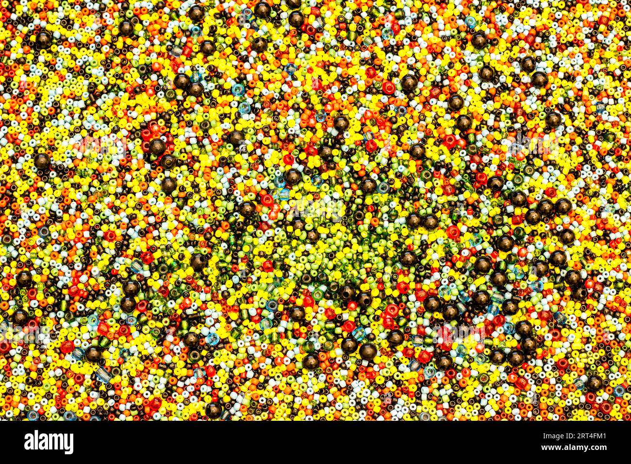 Colorful beads is scattered, close up, background macro Stock Photo - Alamy