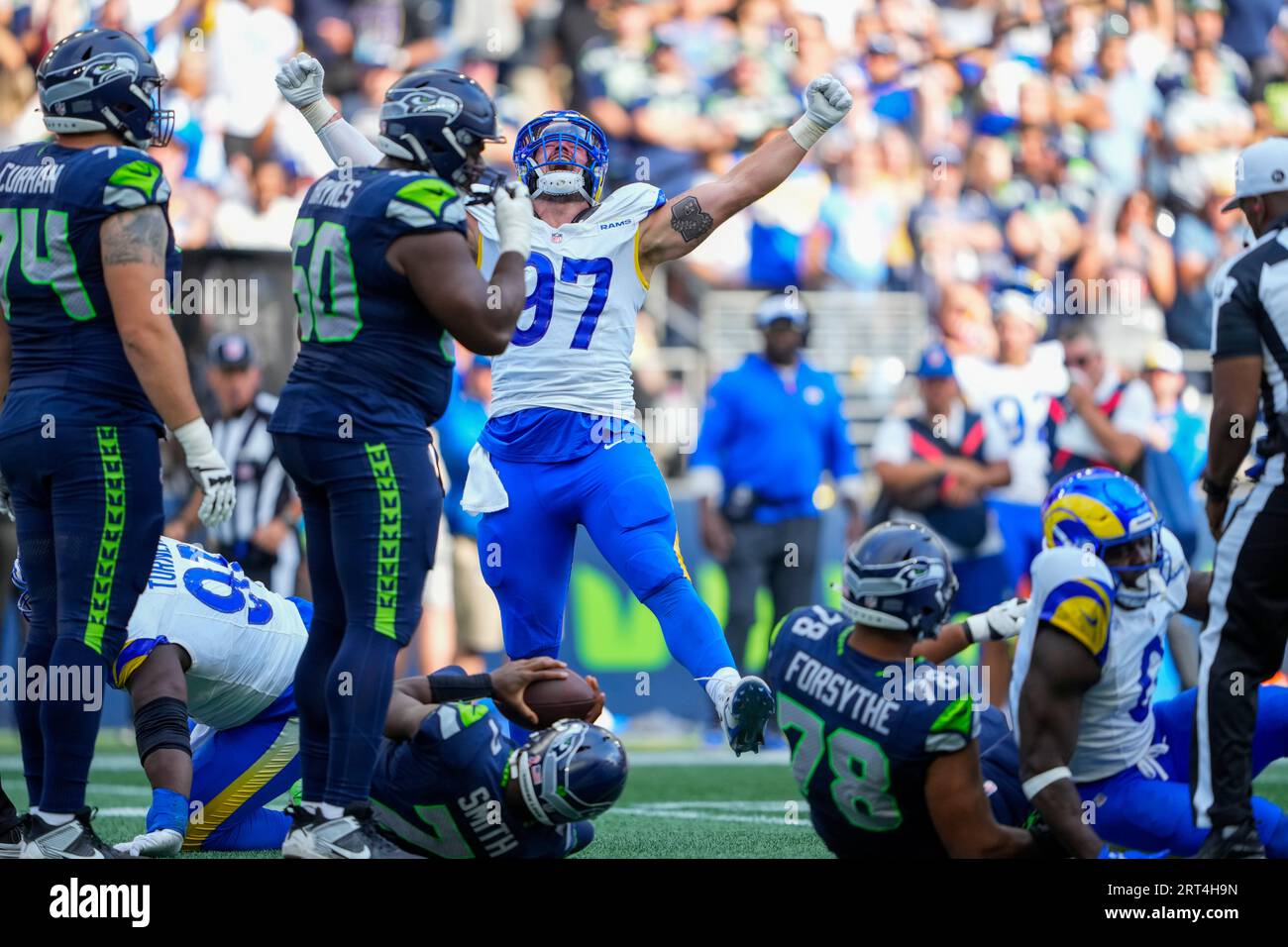 Los Angeles Rams linebacker Michael Hoecht celebrates after sacking ...