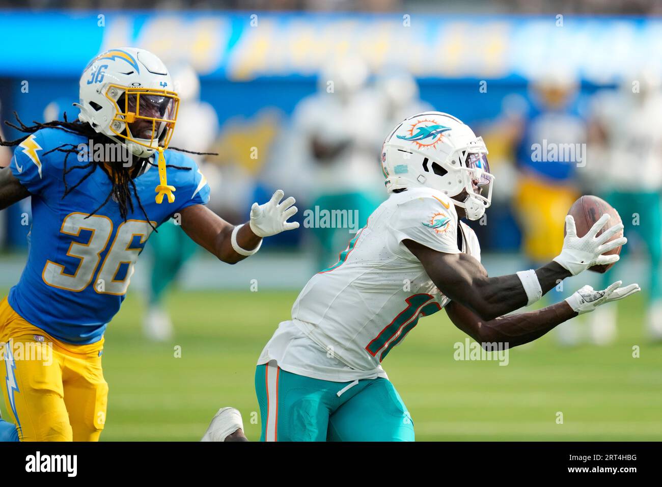 Miami Dolphins wide receiver Tyreek Hill (10) makes a catch in front of ...