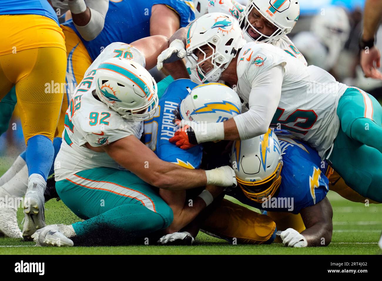 Los Angeles Chargers quarterback Justin Herbert is sacked by Miami ...