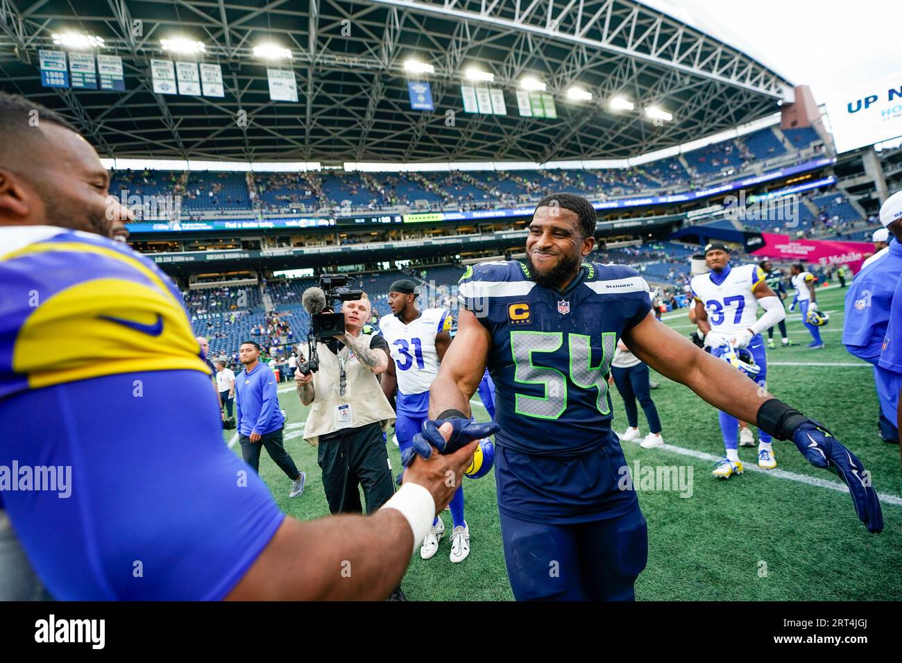 Los Angeles Rams defensive tackle Aaron Donald shakes hands with ...