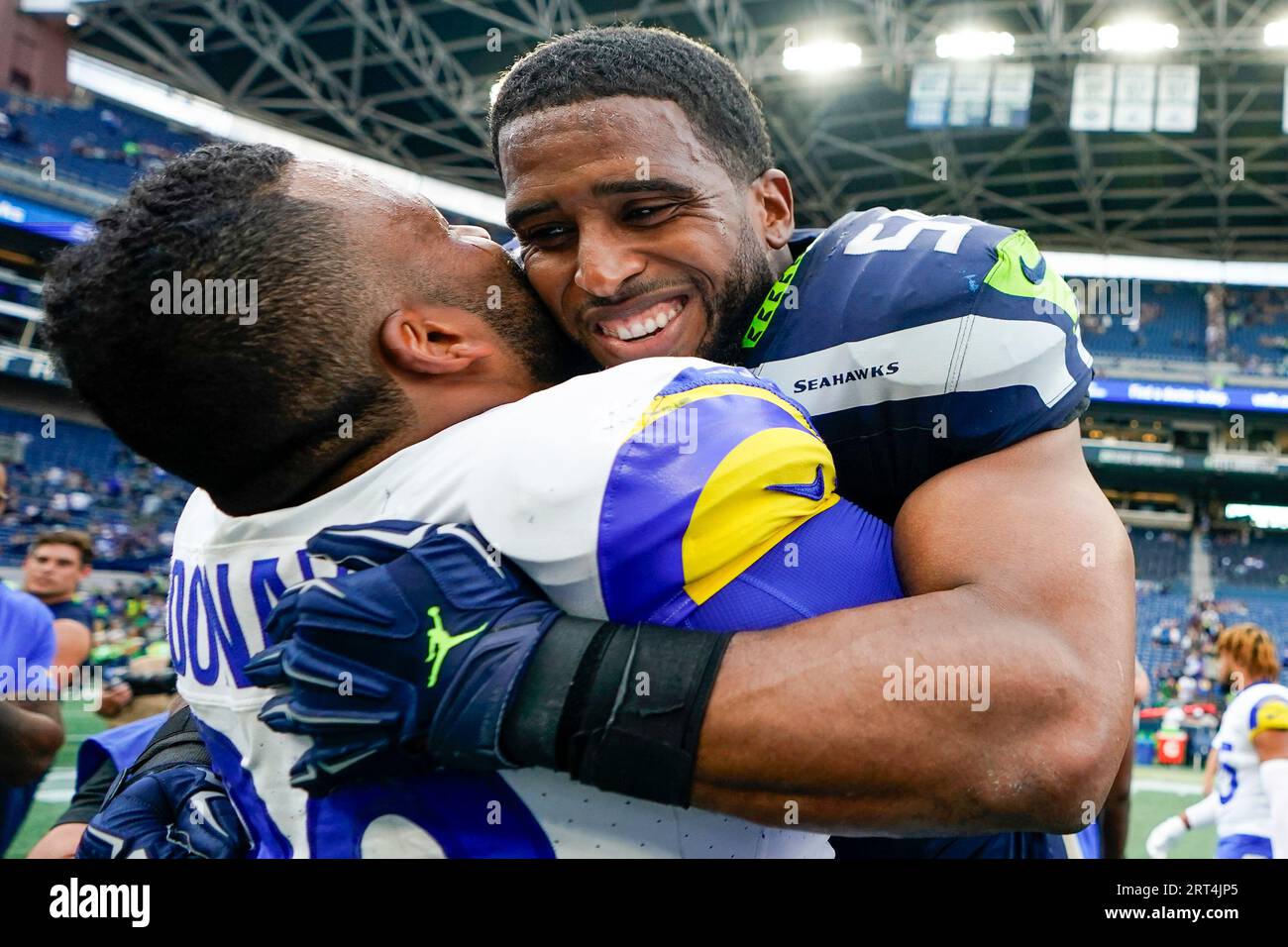 Los Angeles Rams defensive tackle Aaron Donald hugs Seattle Seahawks ...