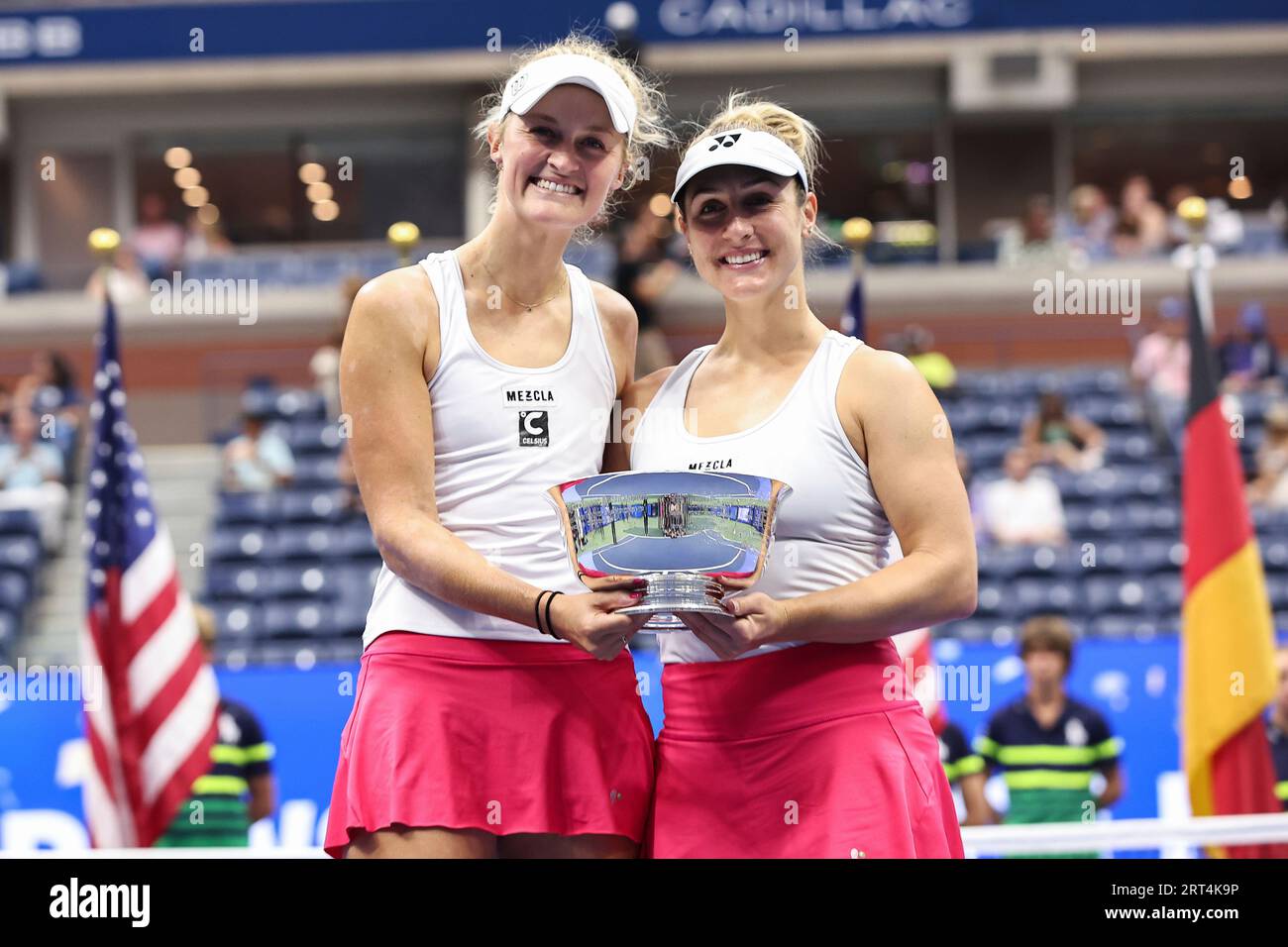 Erin Routliffe and Gabriela Dabrowski pose for a photo during a trophy presentation following a ...