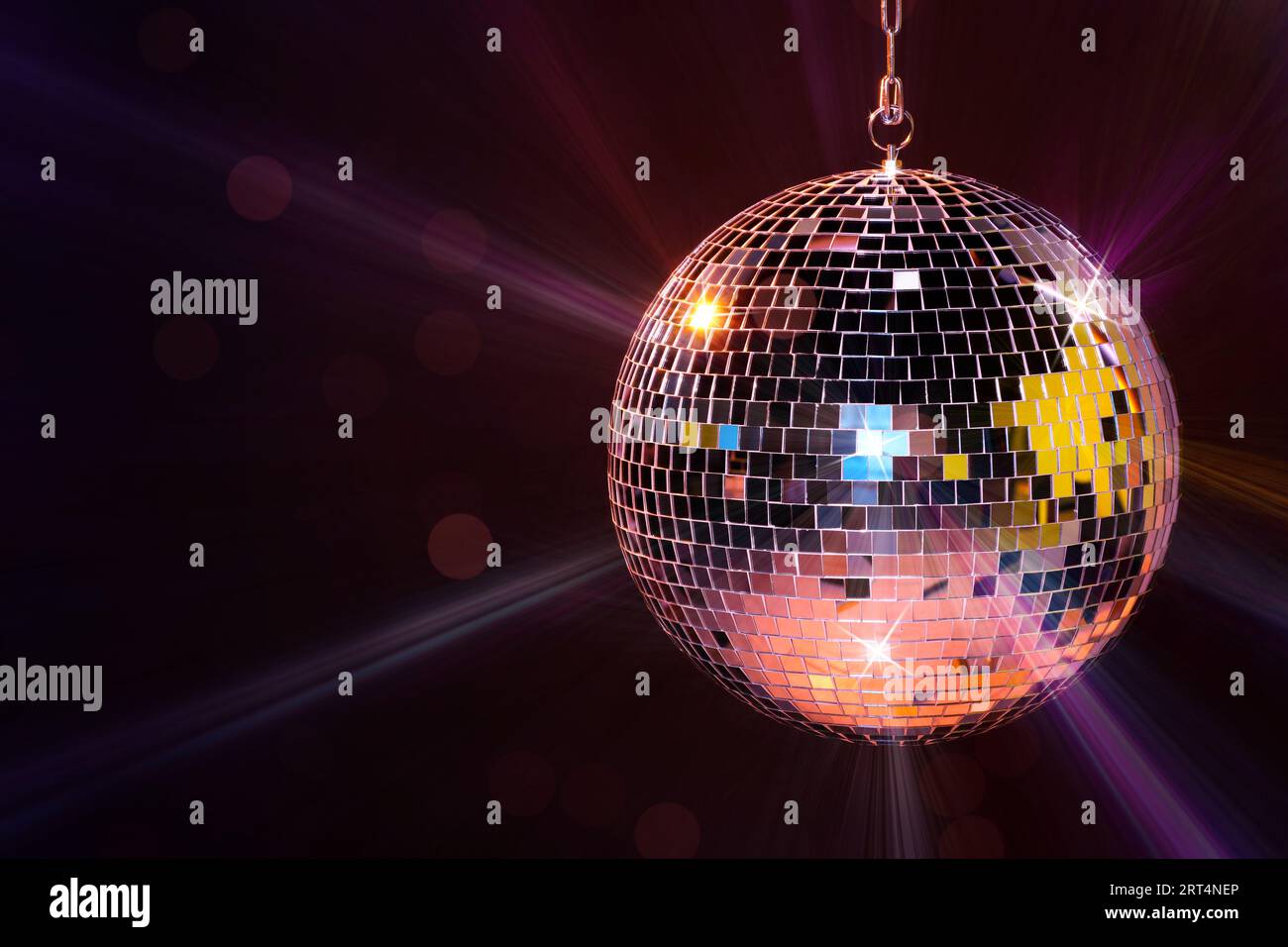 Shiny bright disco ball on dark background, space for text Stock Photo ...