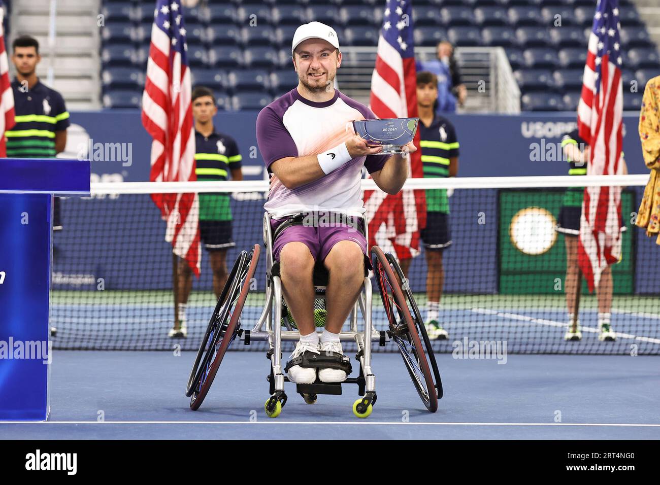 Sam Schroder poses for a photo during a trophy presentation following a ...